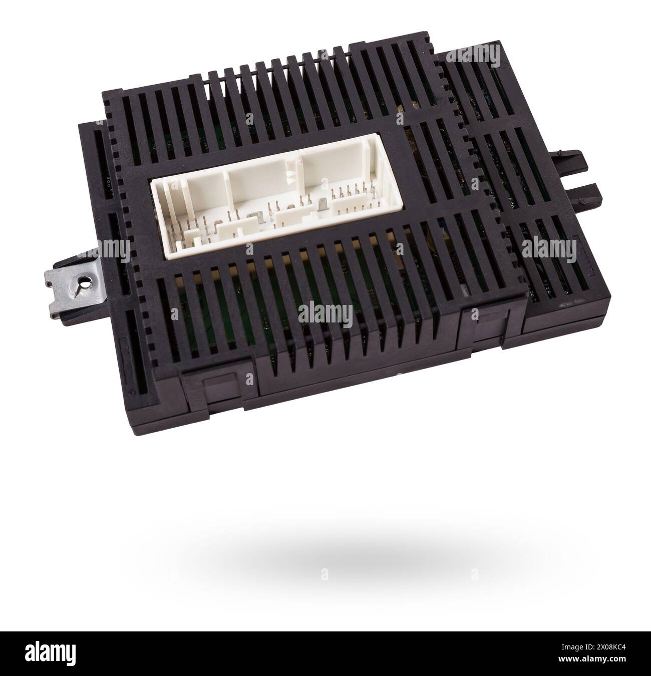 Plastic car engine control unit with metal elements on a white isolated ...