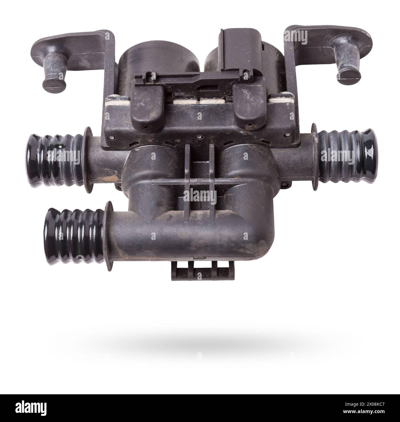 Heating system valve made of black plastic on a white isolated ...