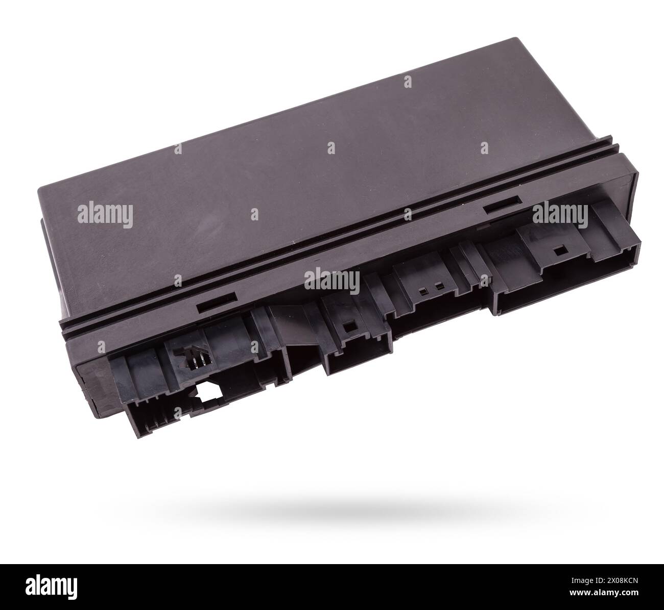 Plastic car engine control unit with metal elements on a white isolated ...