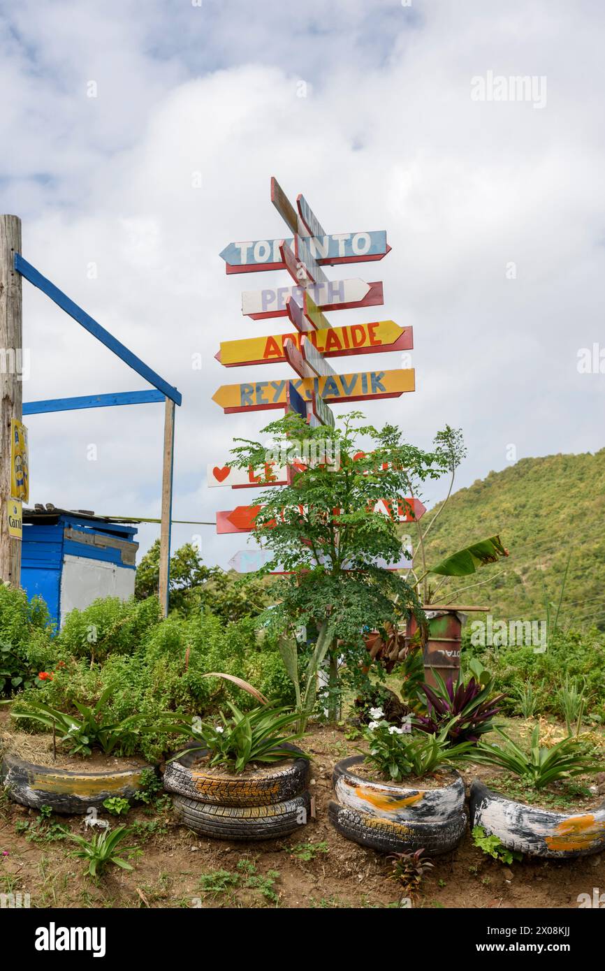 Colourful painted signpost, Port Elizabeth, Bequia Island, St Vincent & the Grenadines ...