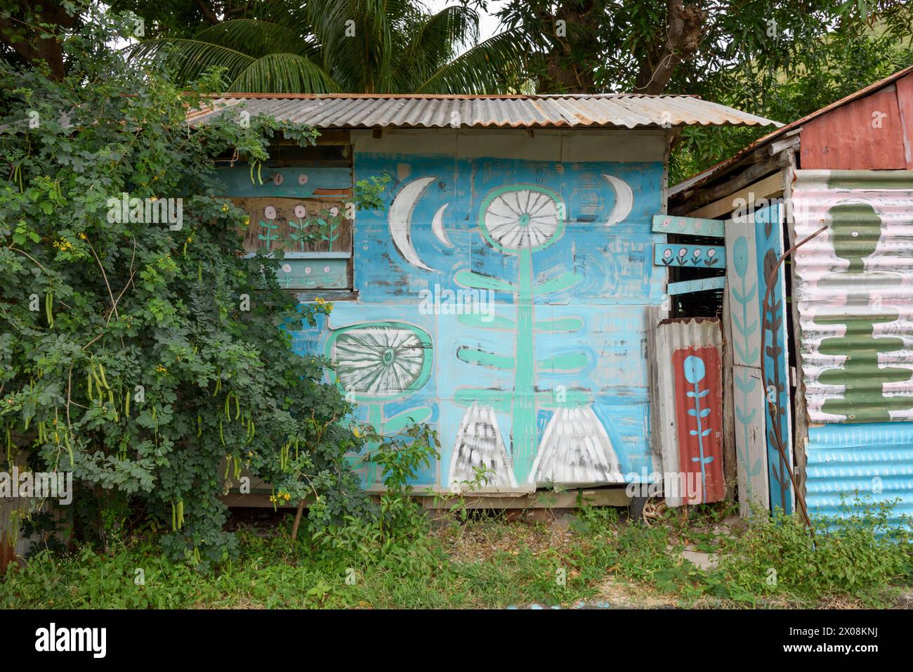 Colourful street art murals on buildings in Port Elizabeth, Bequia ...