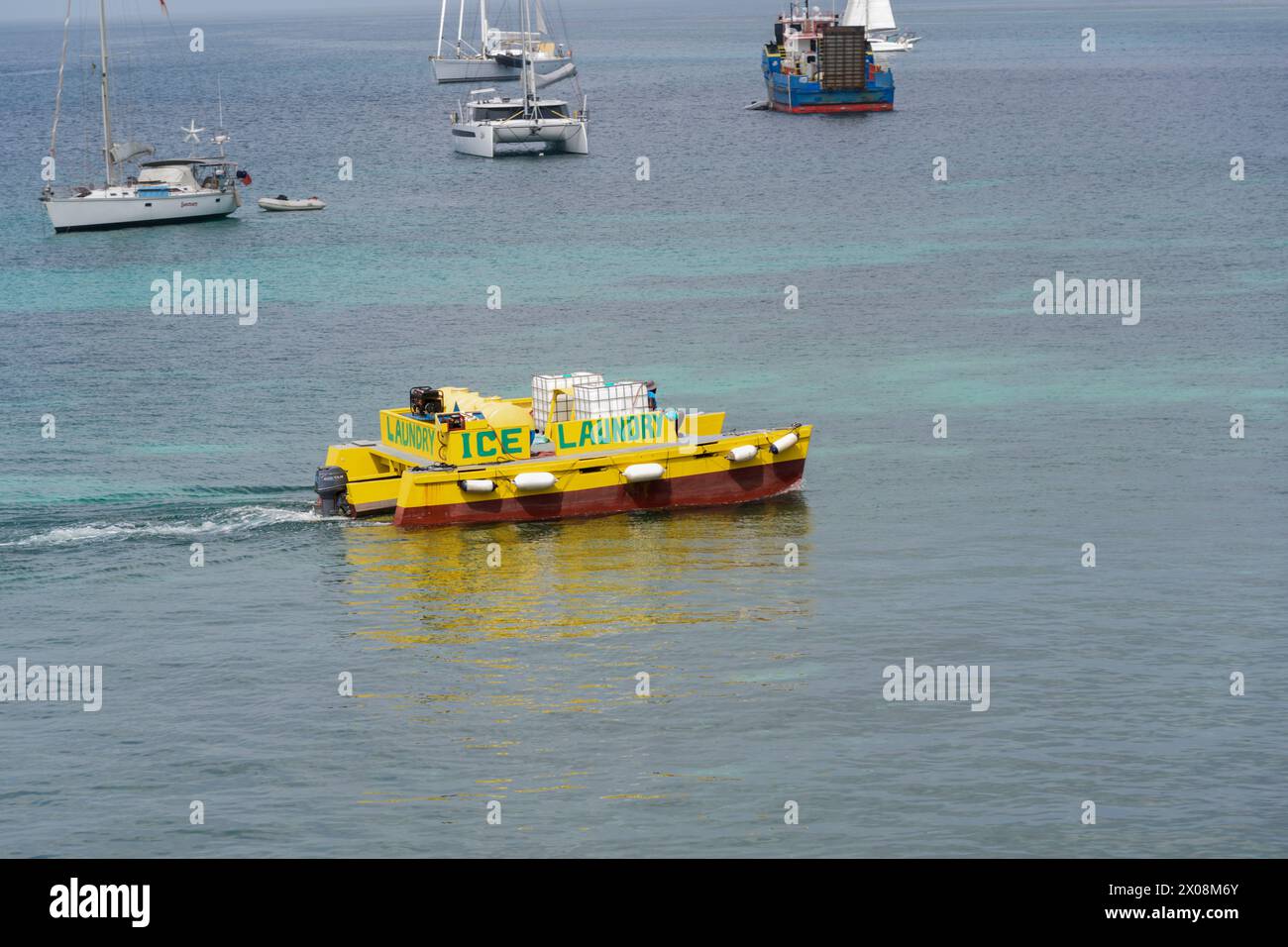 Service boat for ice and laundry in Admiralty Bay harbour, Port ...