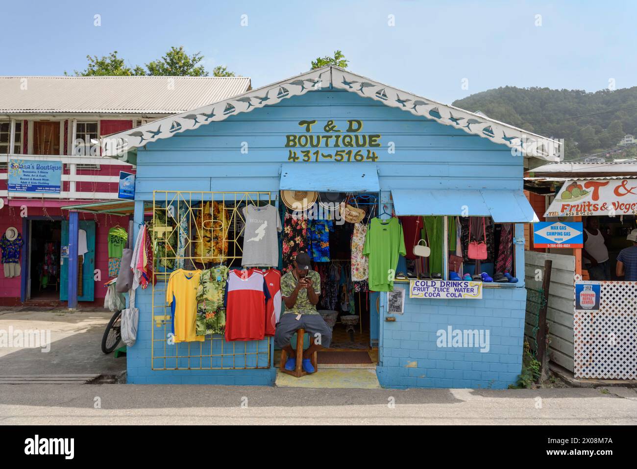 T&D Boutique, a colourful painted clothes shop, Port Elizabeth, Bequia ...