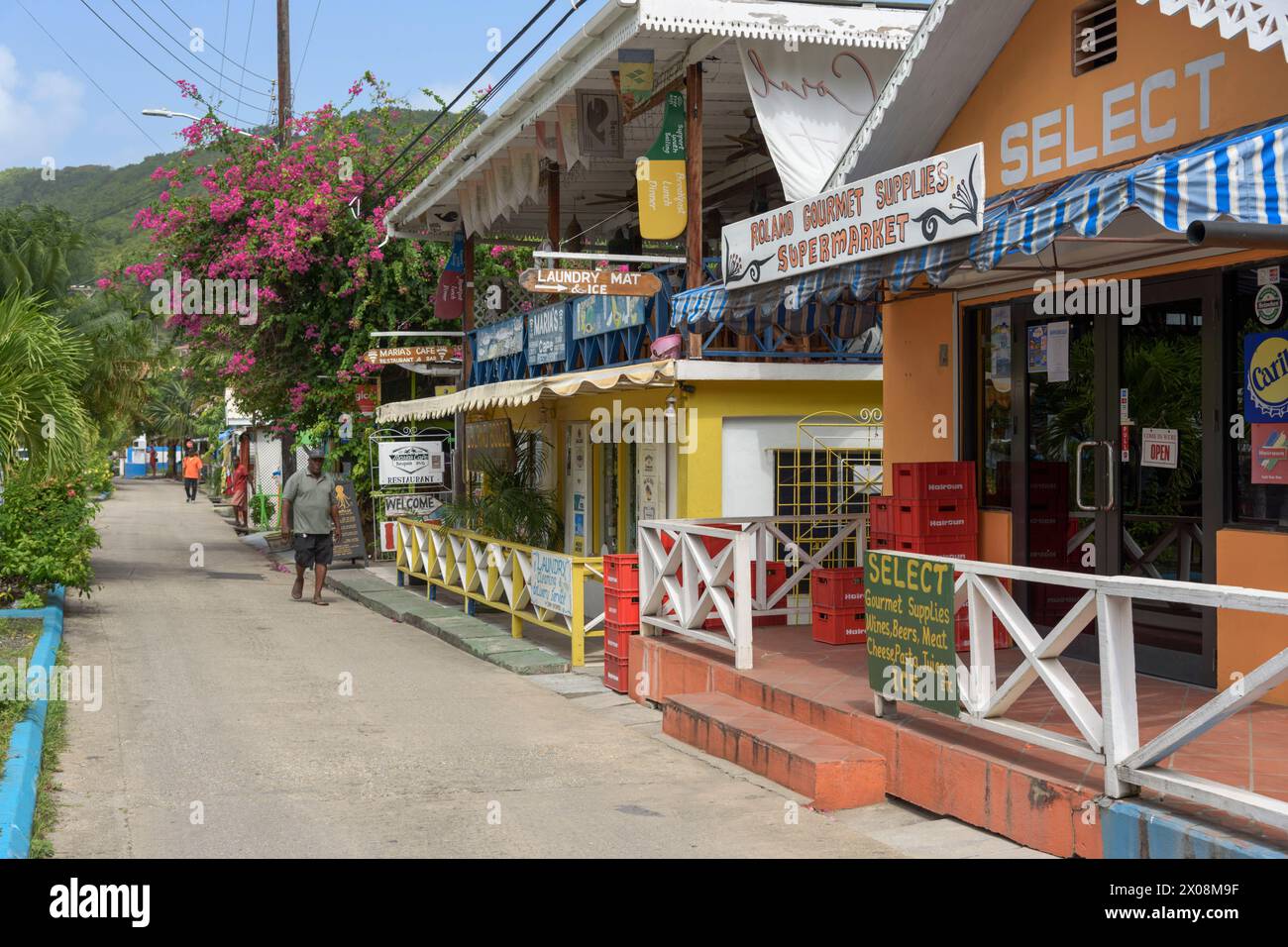 Colourful painted shops and restaurants, Port Elizabeth, Bequia Island ...