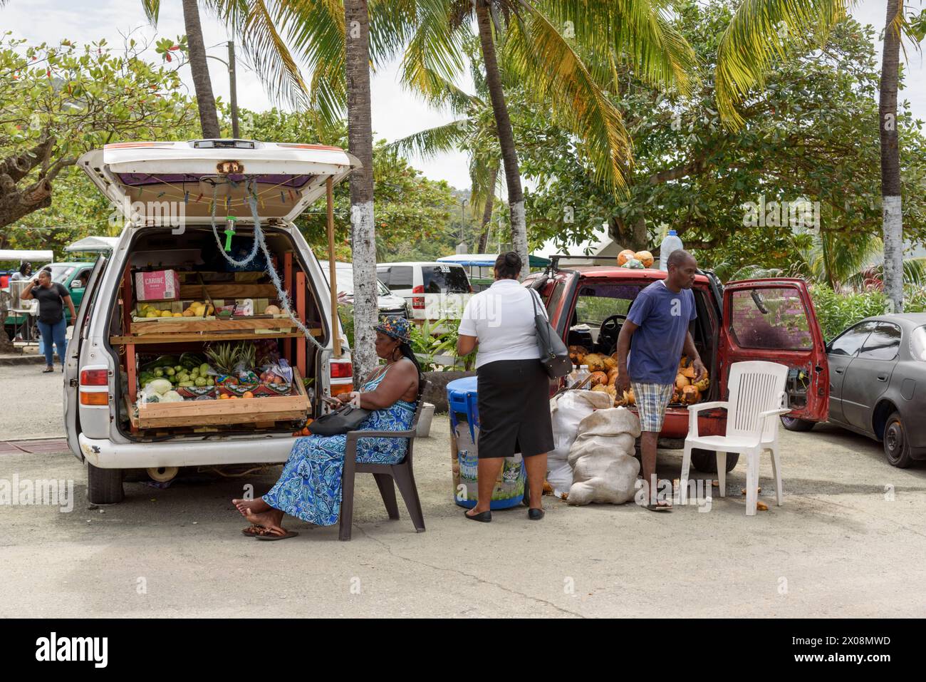 Local people selling fruit and vegetables from the boot of their cars ...