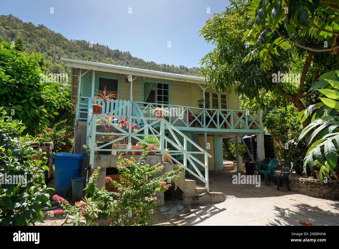 Colourful painted wooden house in Lower Bay, Bequia Island, St Vincent ...