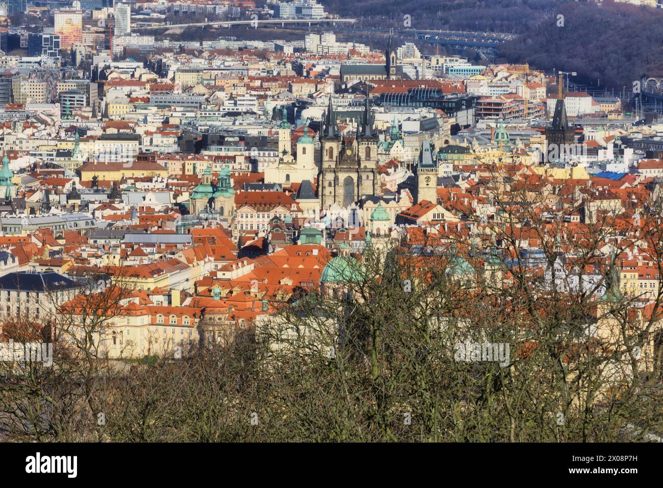 A sprawling European cityscape with historic buildings and modern ...
