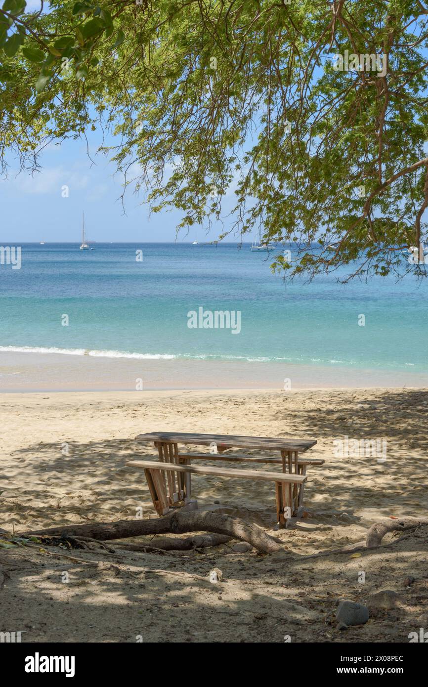 Rustic picnic table at Lower Bay beach, Bequia Island, St Vincent & the ...