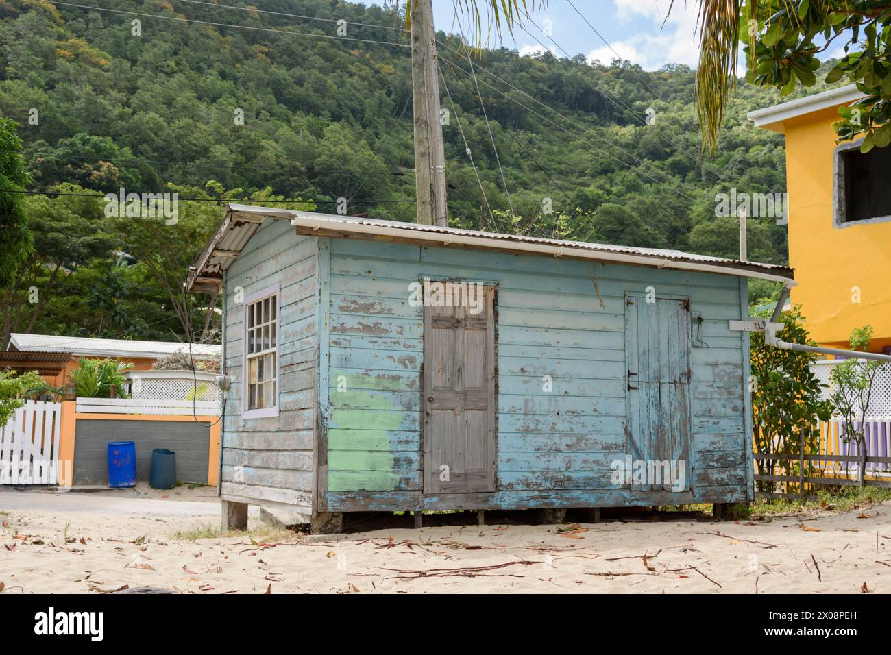 Blue painted wooden beach hut on Lower Bay beach, Bequia Island, St ...