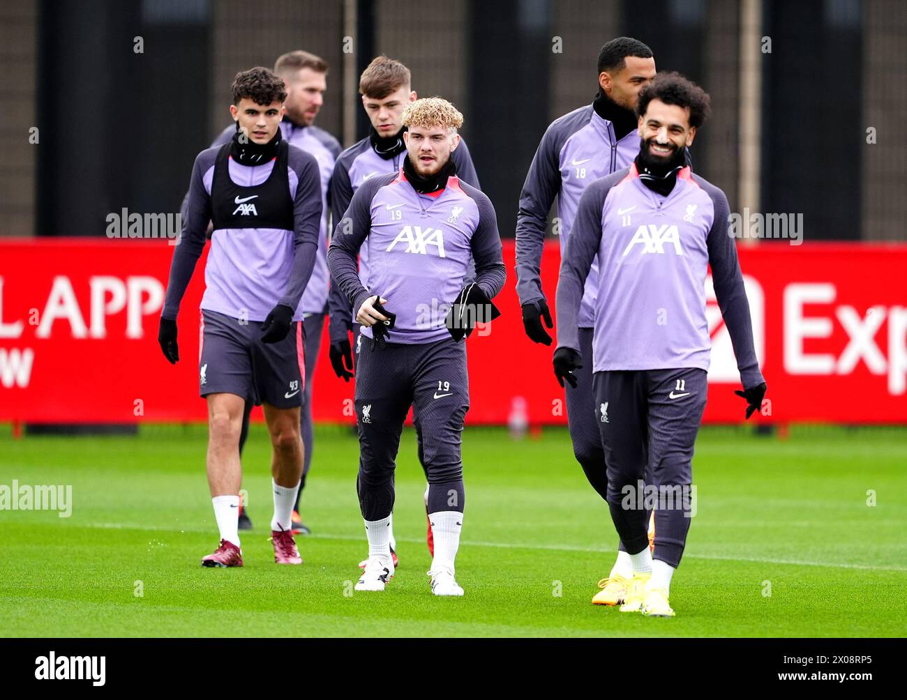 Liverpool's Stefan Bajcetic (left), Harvey Elliott and Mohamed Salah ...