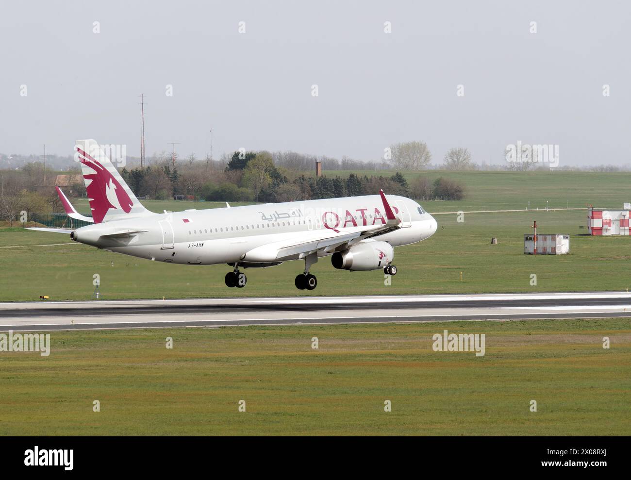 Qatar Airways (is the state-owned flag carrier of Qatar), Airbus A320 ...