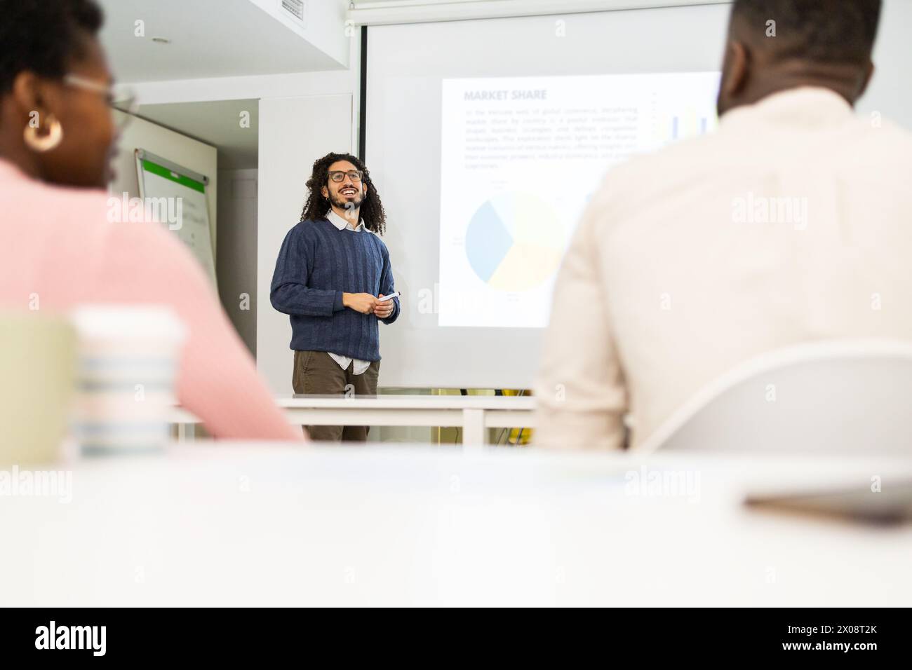 Black man looking presentation slide hi-res stock photography and ...