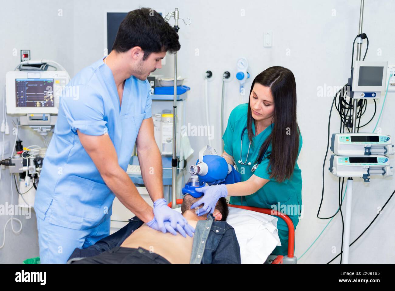 Medics making emergency procedure Stock Photo - Alamy
