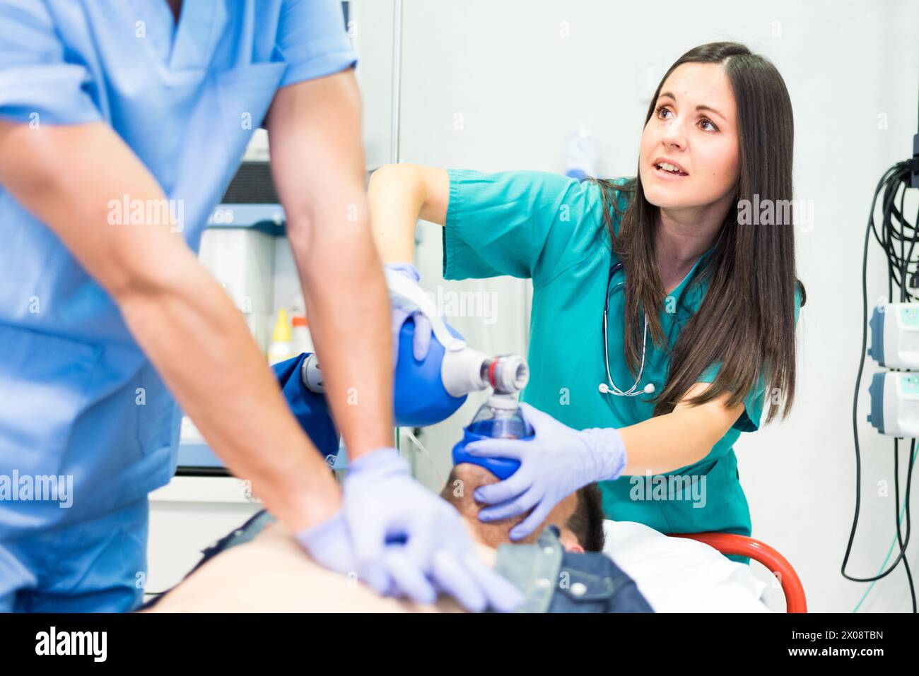 Medics making emergency procedure Stock Photo - Alamy