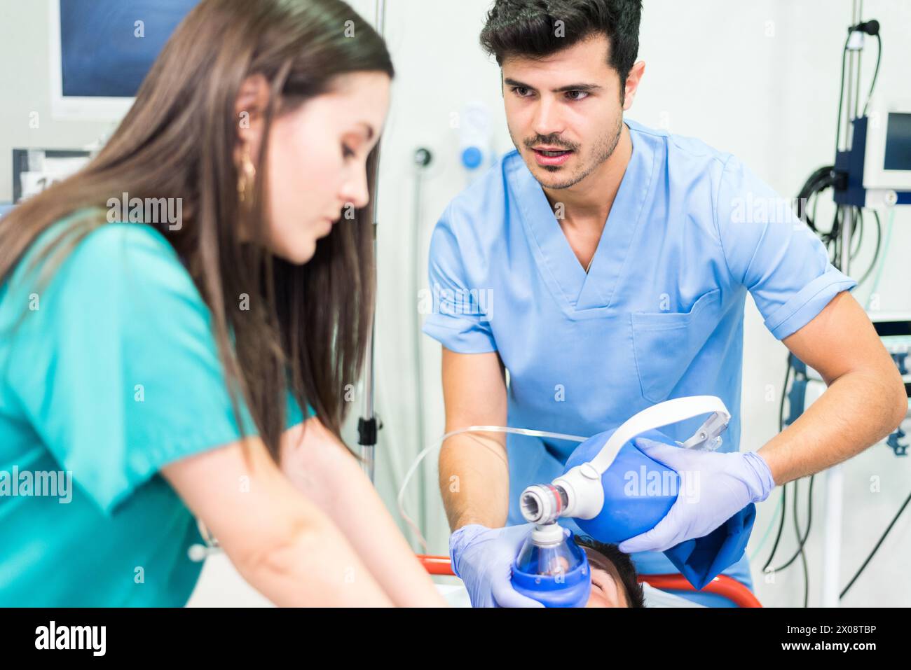 Medics making emergency procedure Stock Photo - Alamy