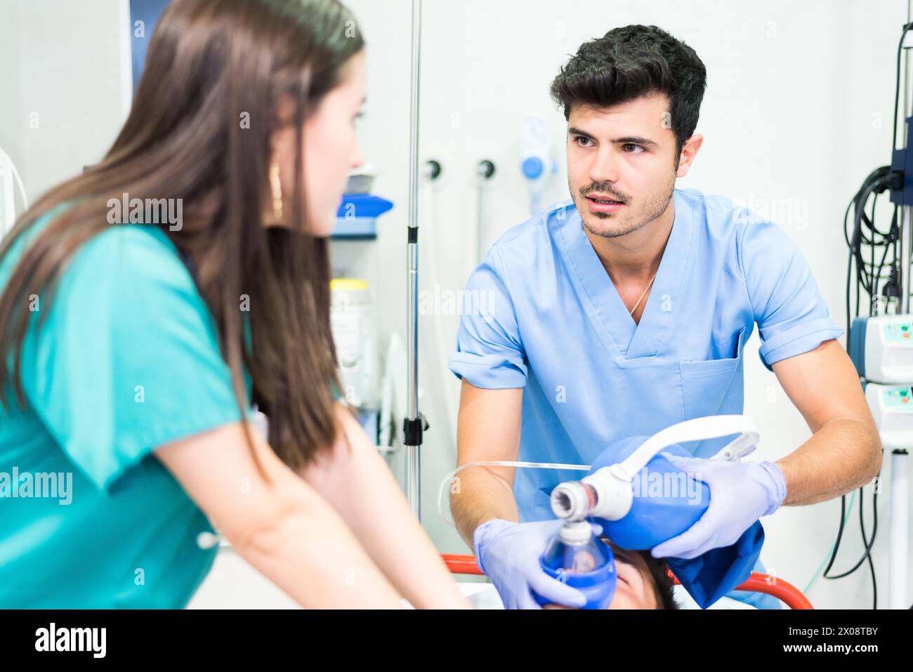 Medics making emergency procedure Stock Photo - Alamy