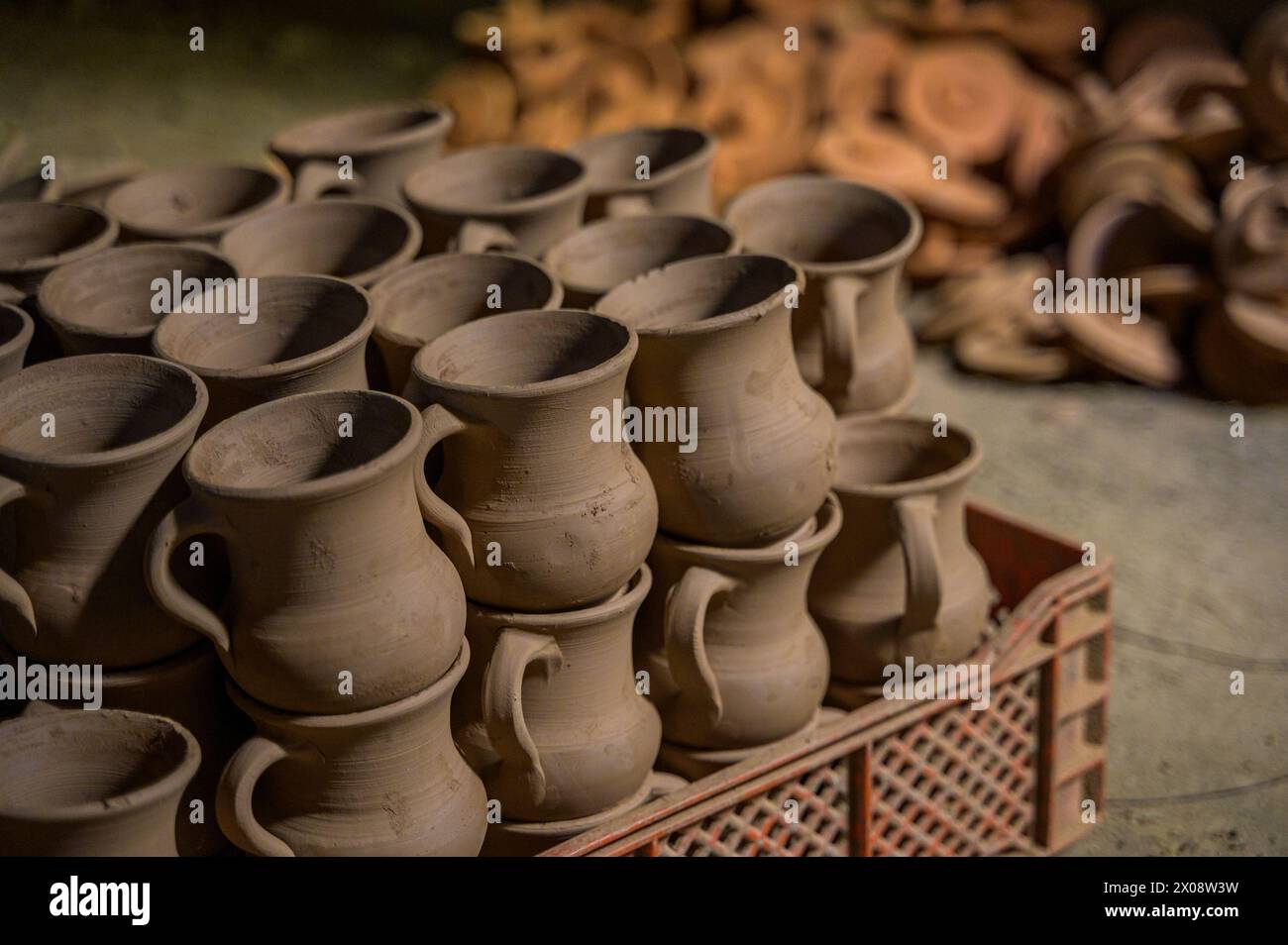 An array of unfinished Indo Moroccan clay pots are showcased in this ...