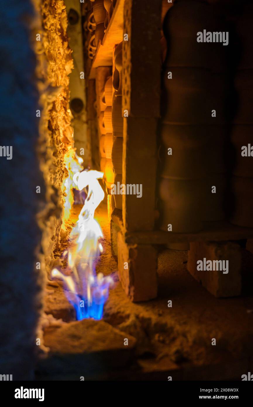 An intimate view inside a kiln, showcasing the traditional firing ...