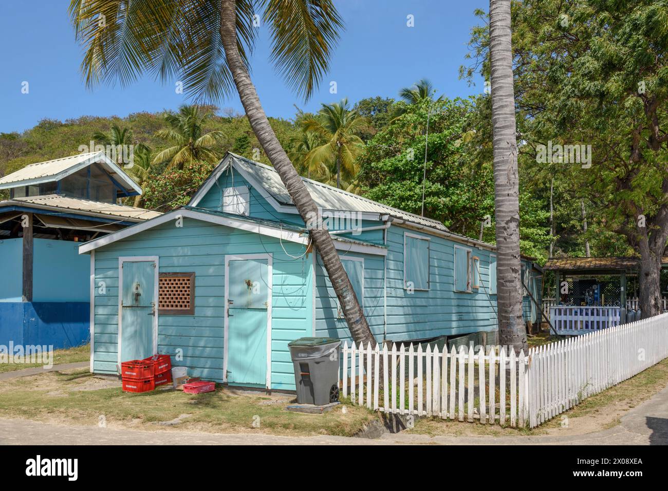 Colourful painted wooden buildings in Britannia Bay, Lovell Village ...
