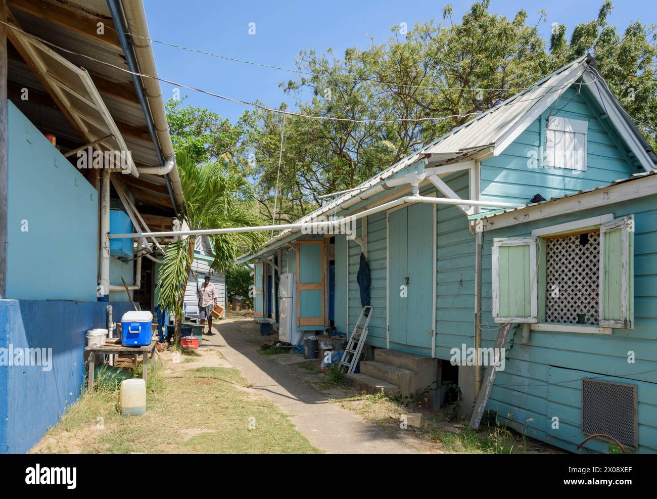 Colourful painted wooden buildings in Britannia Bay, Lovell Village ...