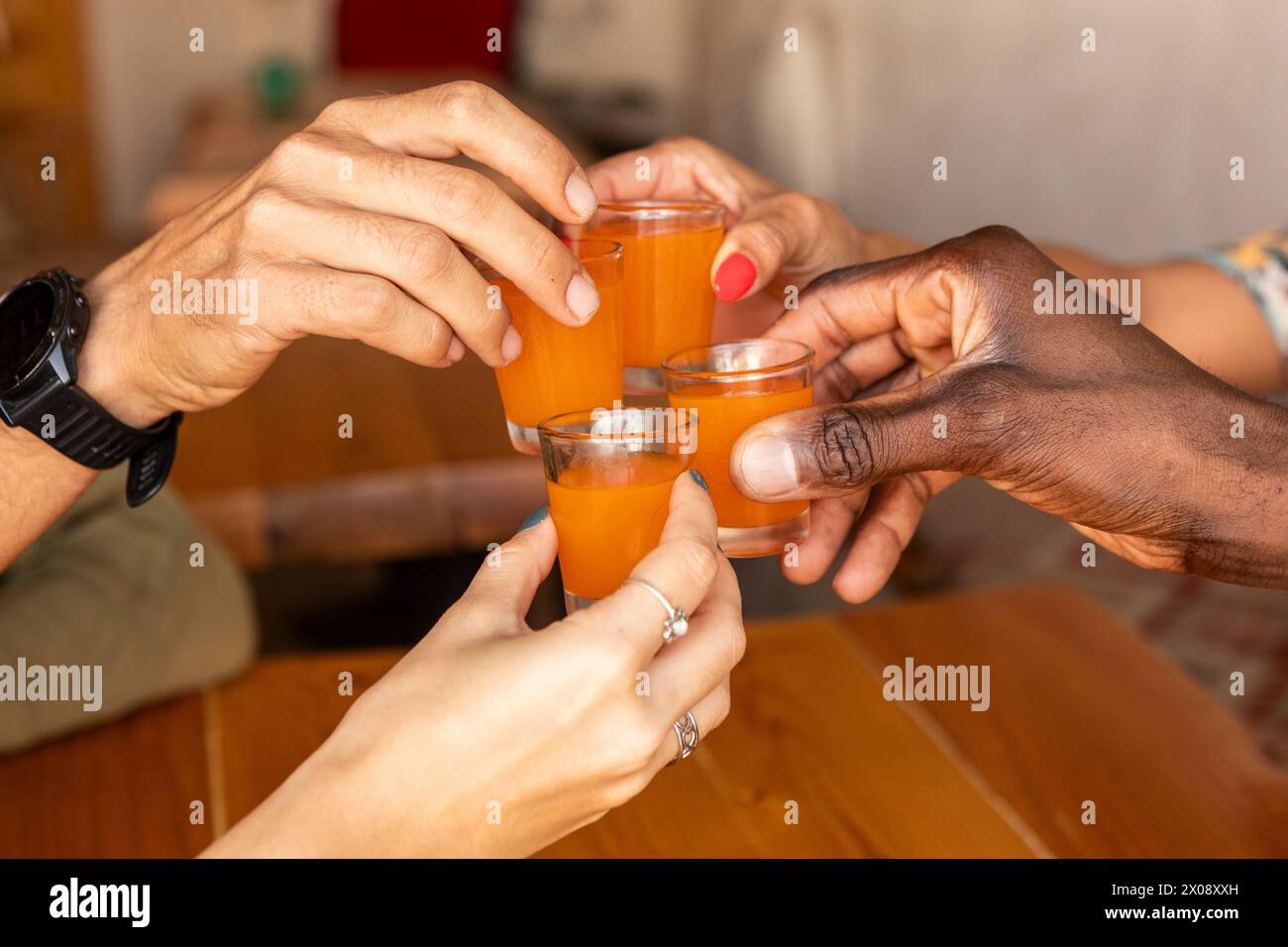 Hands toasting shots hi-res stock photography and images - Alamy