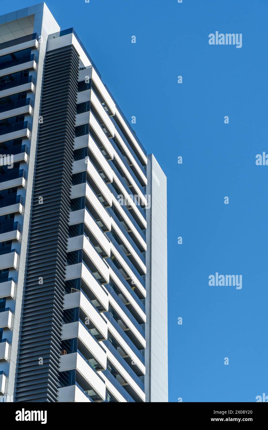 Striking image of a modern high-rise building with white and black ...