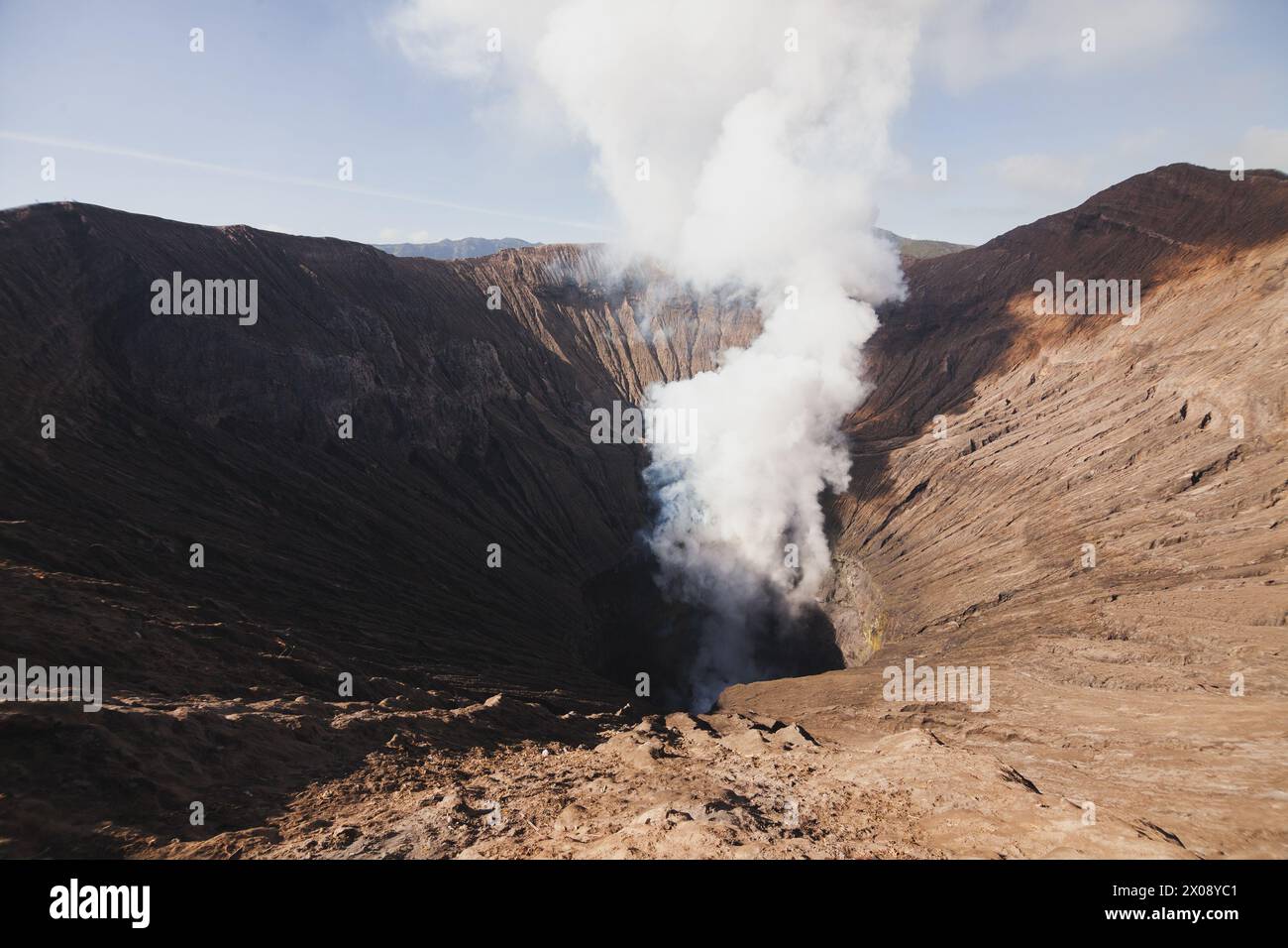 A breathtaking view of an active smoking volcano crater, capturing the ...