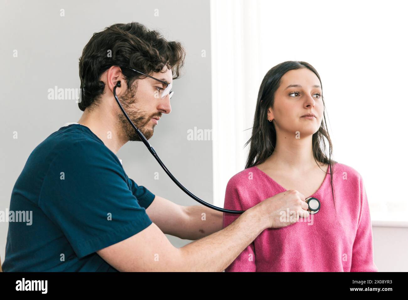 Doctor exam female auscultation hi-res stock photography and images - Alamy