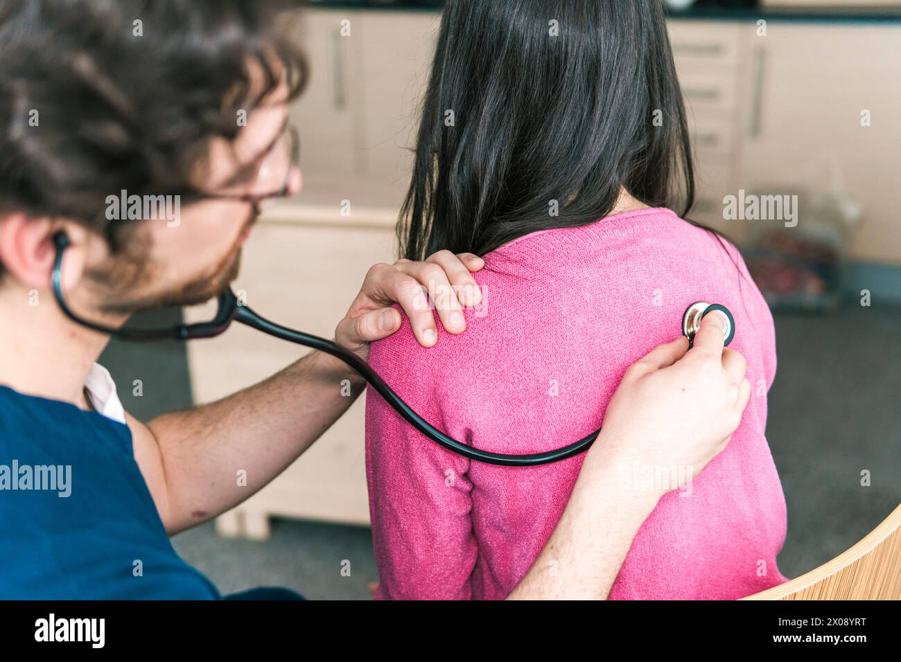 Doctor exam female auscultation hi-res stock photography and images - Alamy