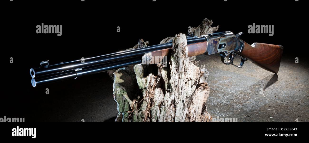 Cowboy style lever action rifle with colorful oiled stock and color ...