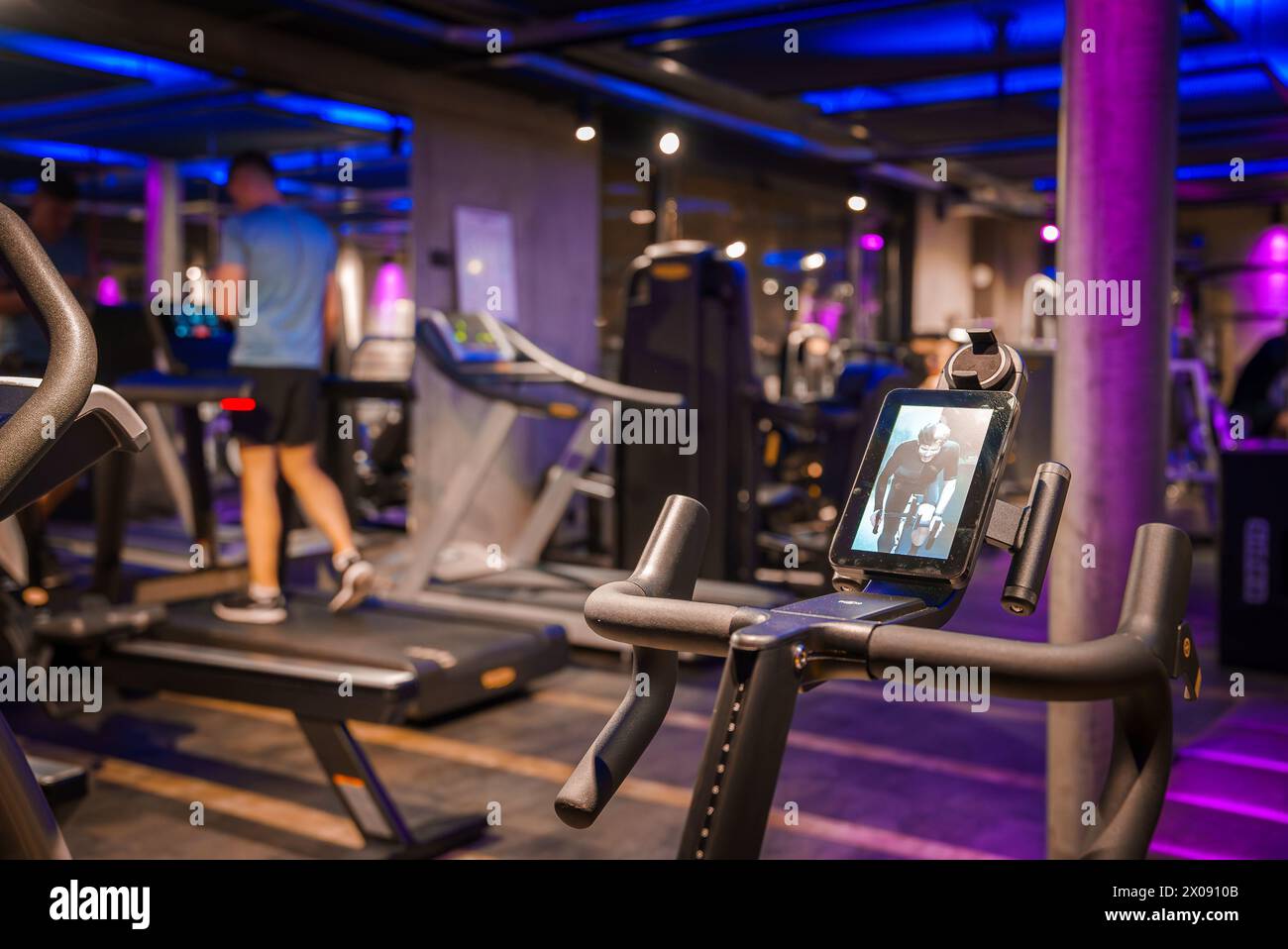 Luxury gym with digital tablet on exercise bike in Zermatt ski resort ...