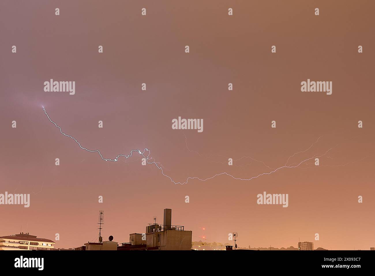 Lightning in a dark gray sky during a storm. Dramatic sky Stock Photo ...