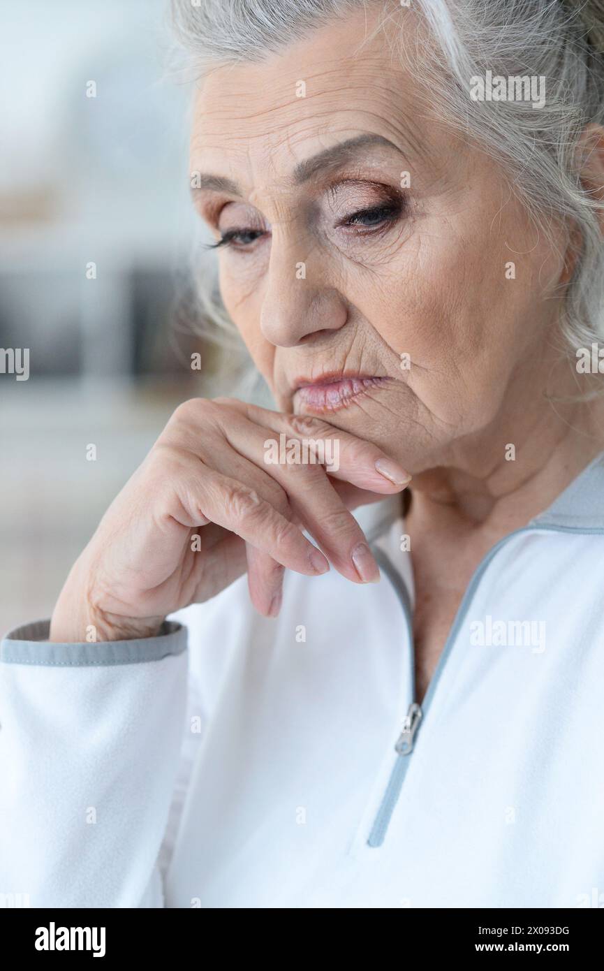 Close up portrait of a sick senior woman Stock Photo - Alamy