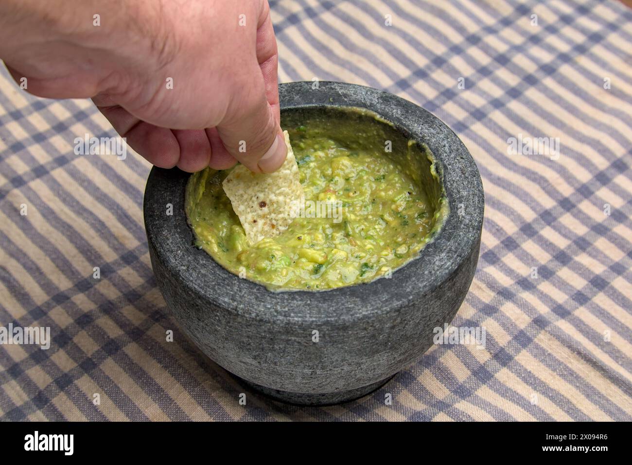 guacamole inside molcajete (traditional mexican mortar and pestle for ...