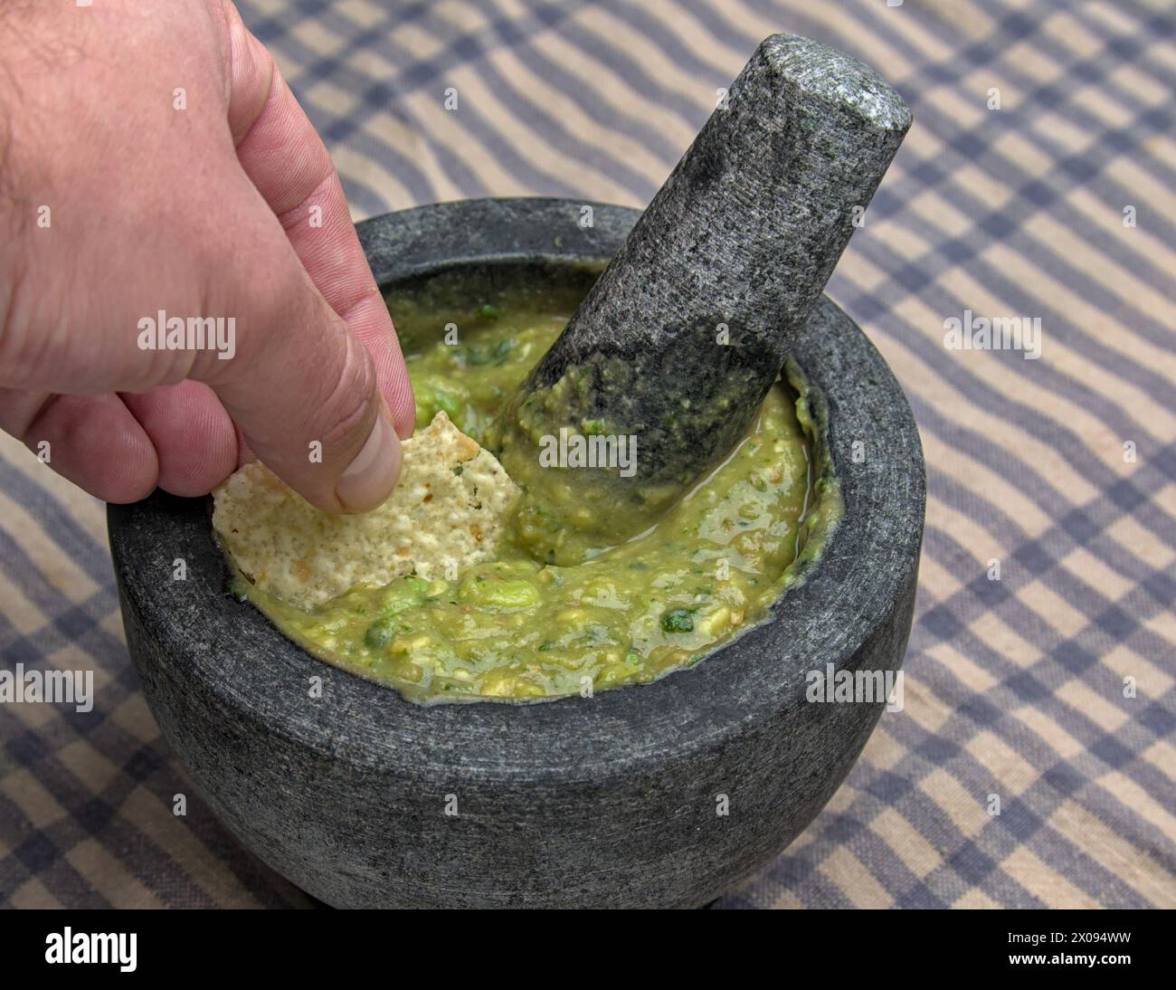 guacamole inside molcajete (traditional mexican mortar and pestle for ...