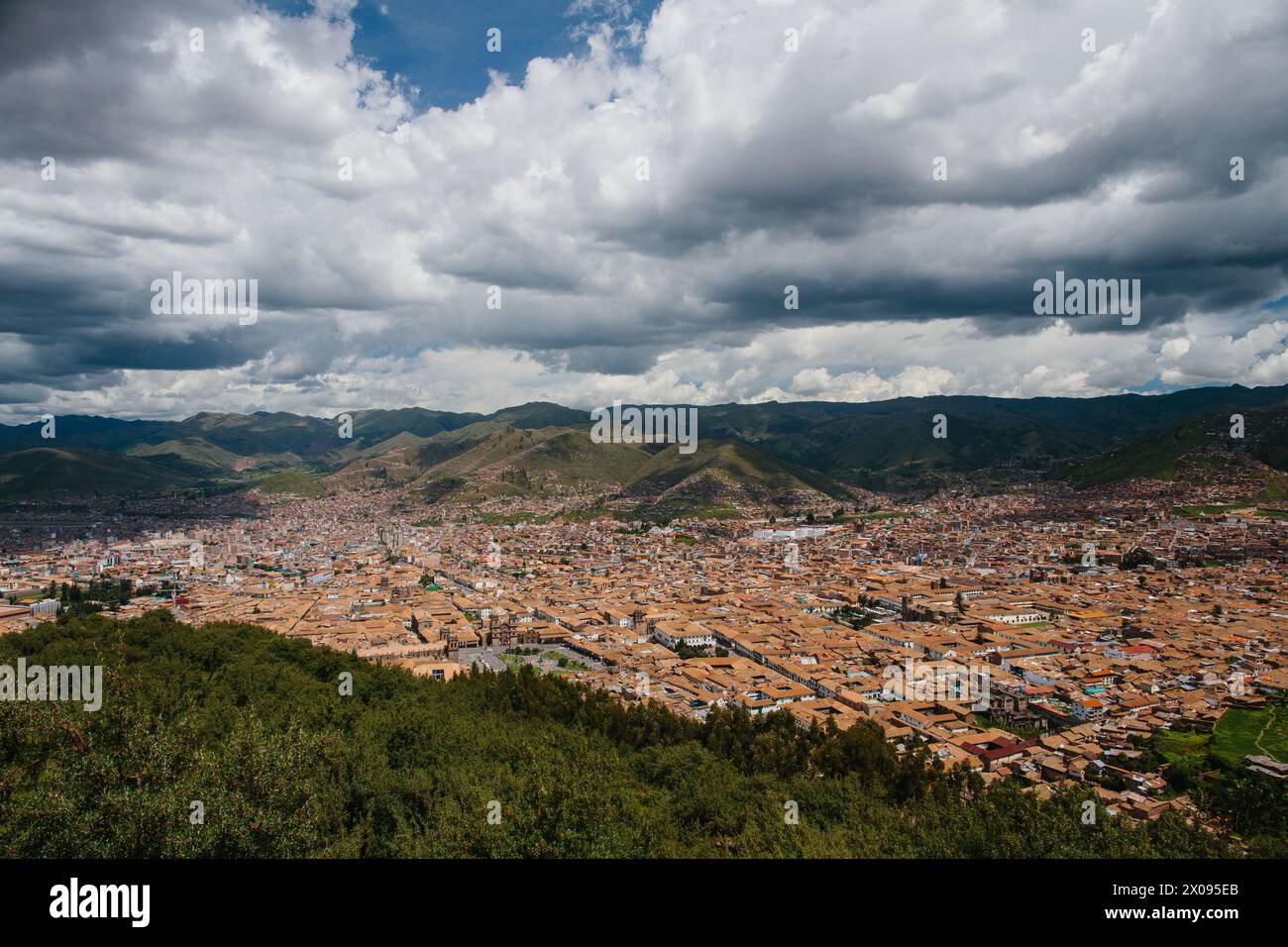 View of the historic city streets and clay houses of cusco city in ...