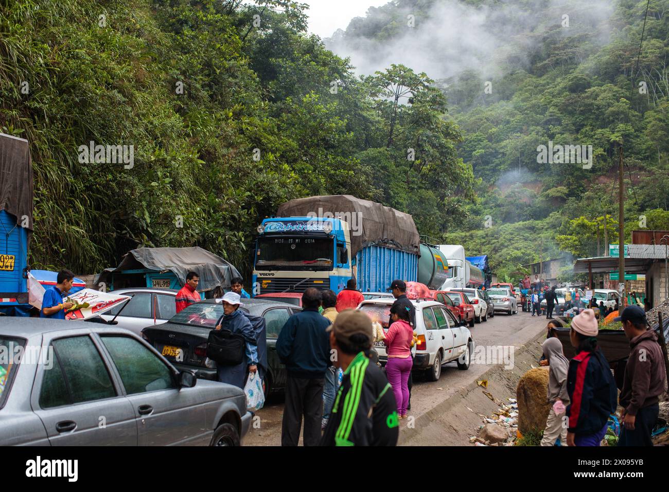 A massive landslide covers the road between Huanuco and Tingo Maria in ...