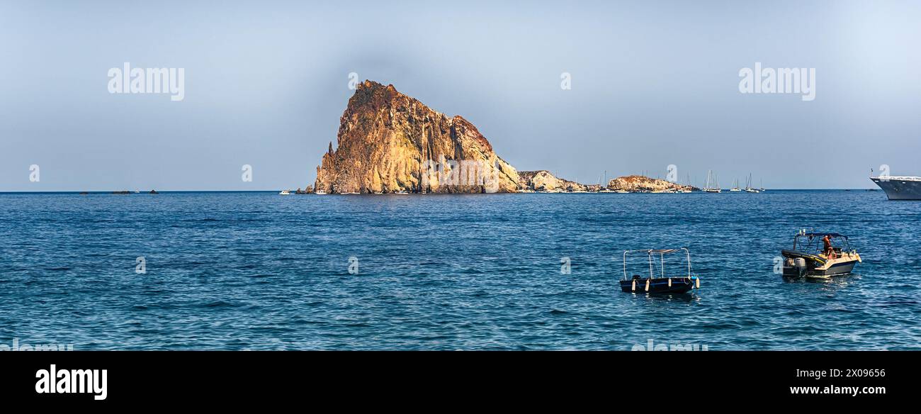 View of Dattilo's rock from the beach of Panarea, the smallest of the ...