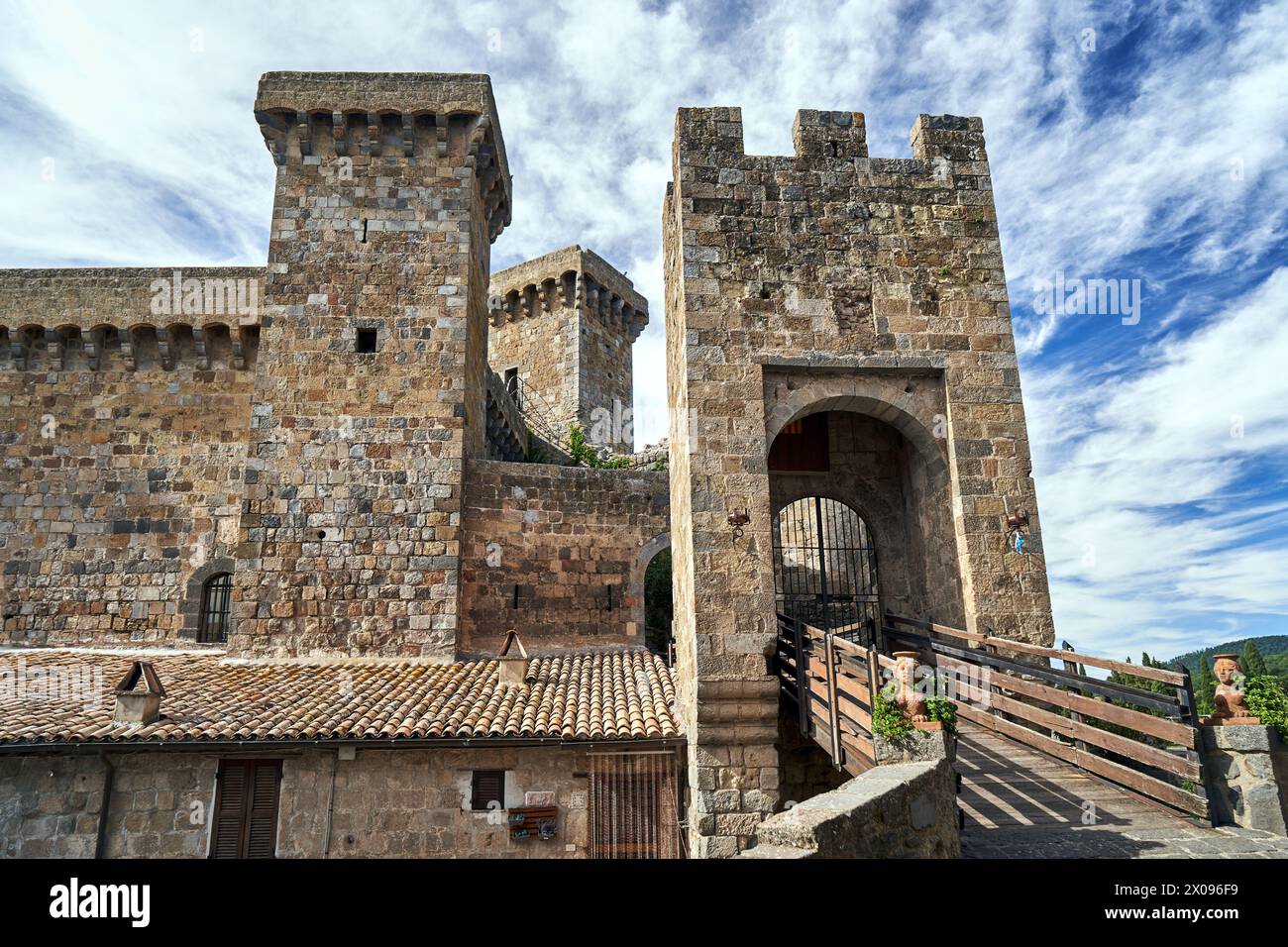 medieval bridge, gate and stone towers in the town of Bolsena Stock ...