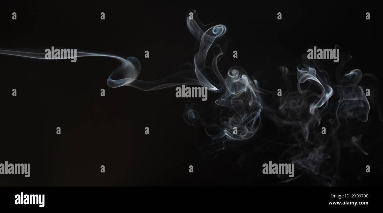 Blue and gray smoke shape close up view on black background Stock Photo ...