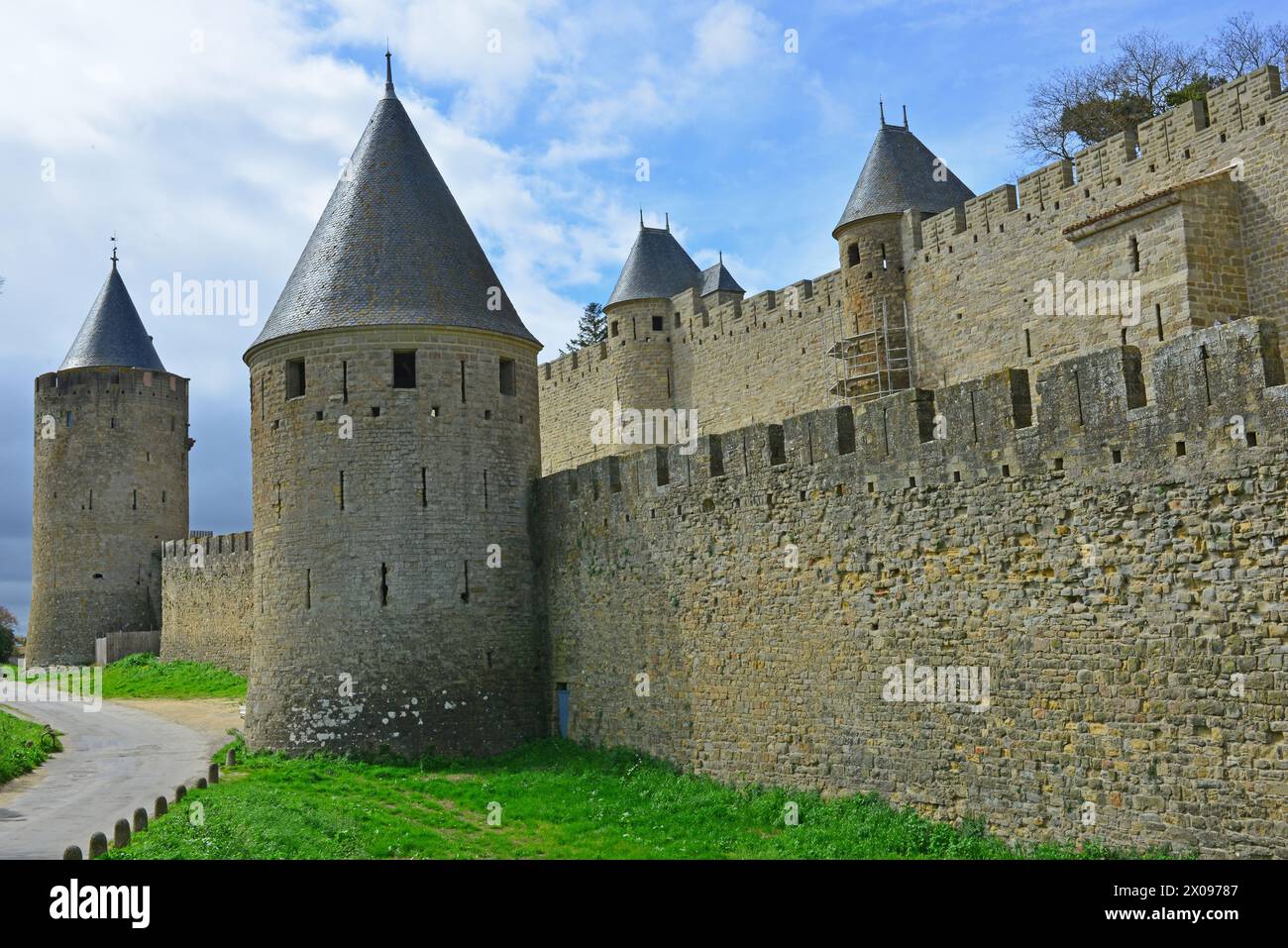 The medieval walls and towers of the fortified town of UNESCO listed ...