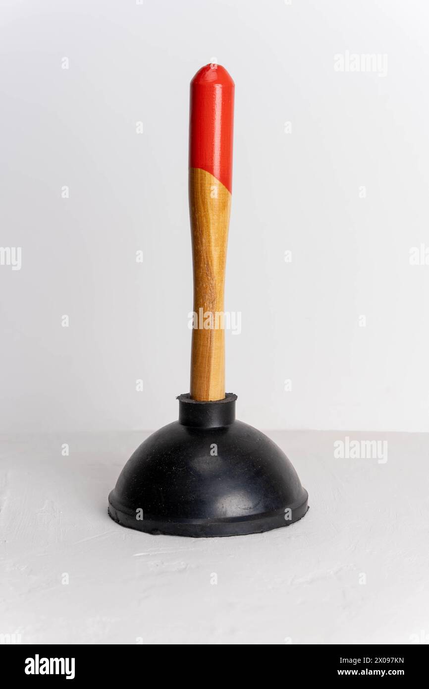 A white background with a plunger for cleaning sink blockages. This ...