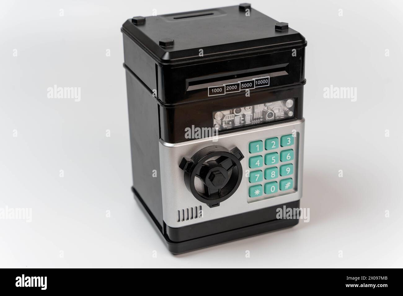 A miniature toy safe positioned on a clean white background, featuring ...