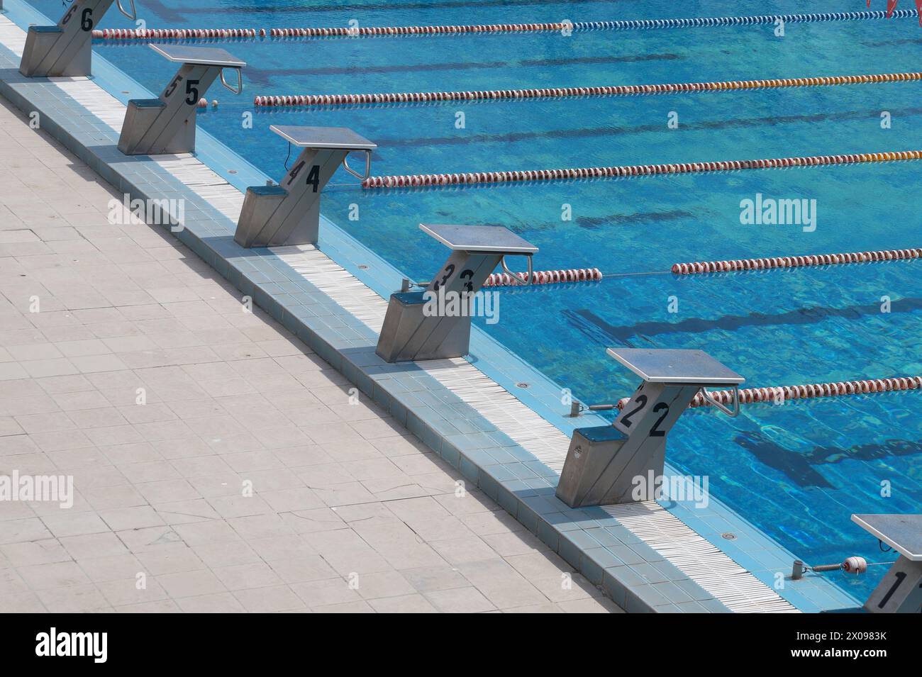 Swimming pool starting blocks numbers swimming hi-res stock photography ...