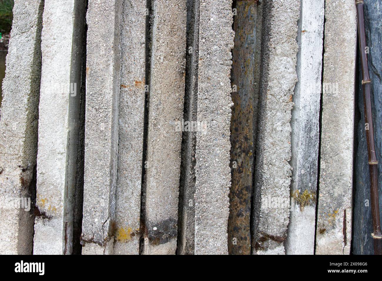 Background made with several parts of cement bars exposed vertically ...