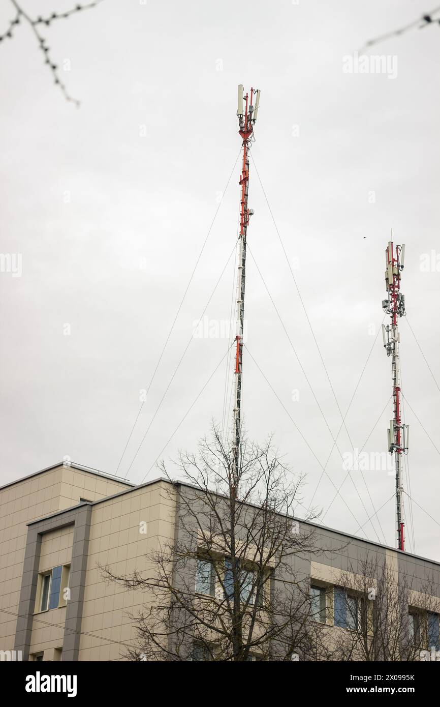 Telecommunication tower with 5G cellular network antenna on city ...
