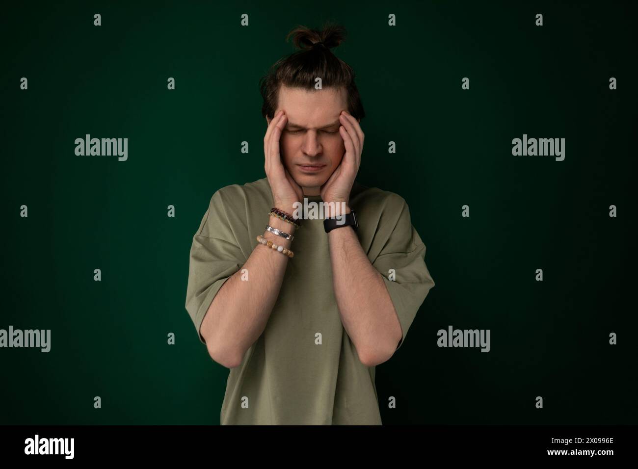 Man Holding Hands to Face Stock Photo - Alamy