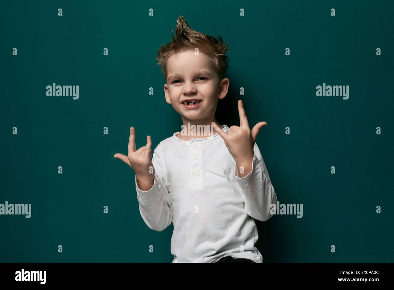 Little Boy Making a Peace Sign Stock Photo - Alamy