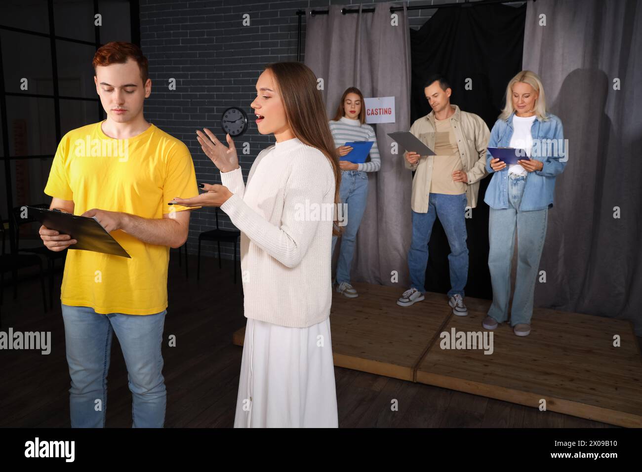 Actors casting on stage in audition room Stock Photo - Alamy