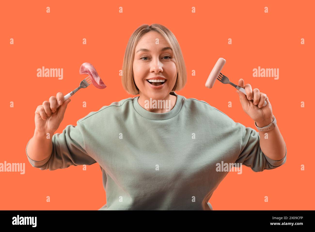 Beautiful woman sausage ham hi-res stock photography and images - Alamy